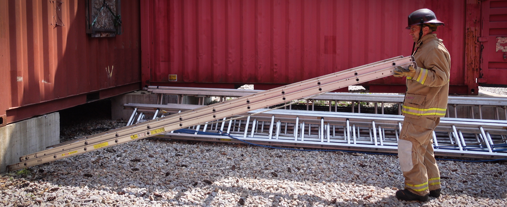 Ladders: Using a building for stability while raising - New Hampshire ...